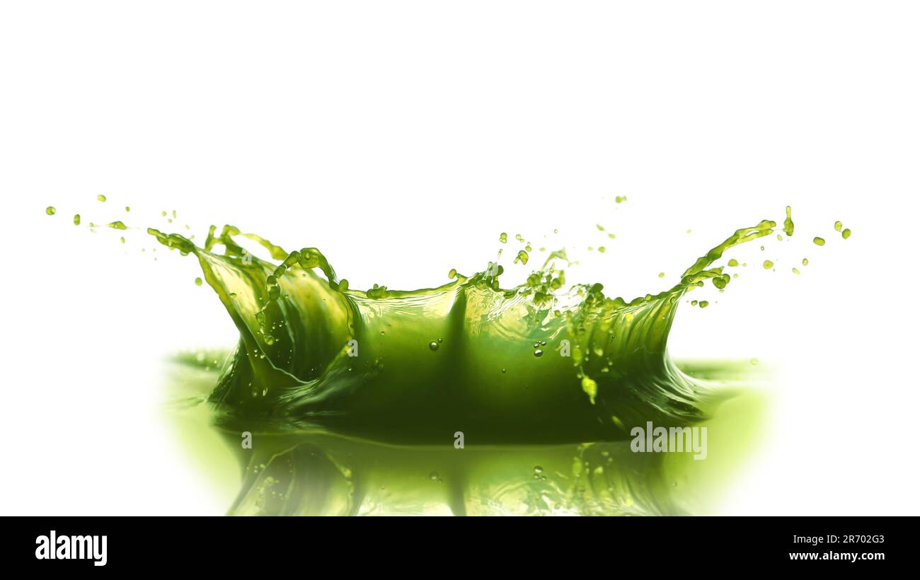 Splashing tasty fresh juice on white background Stock Photo - Alamy
