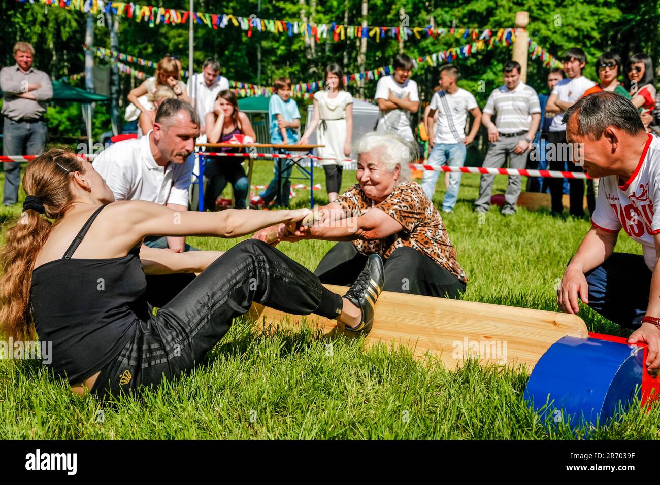 Women Performing Mas-wrestling Game At City Park With Traditional Stick ...