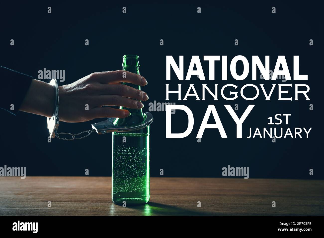 National hangover day - January 1st. Woman handcuffed to bottle of beer ...