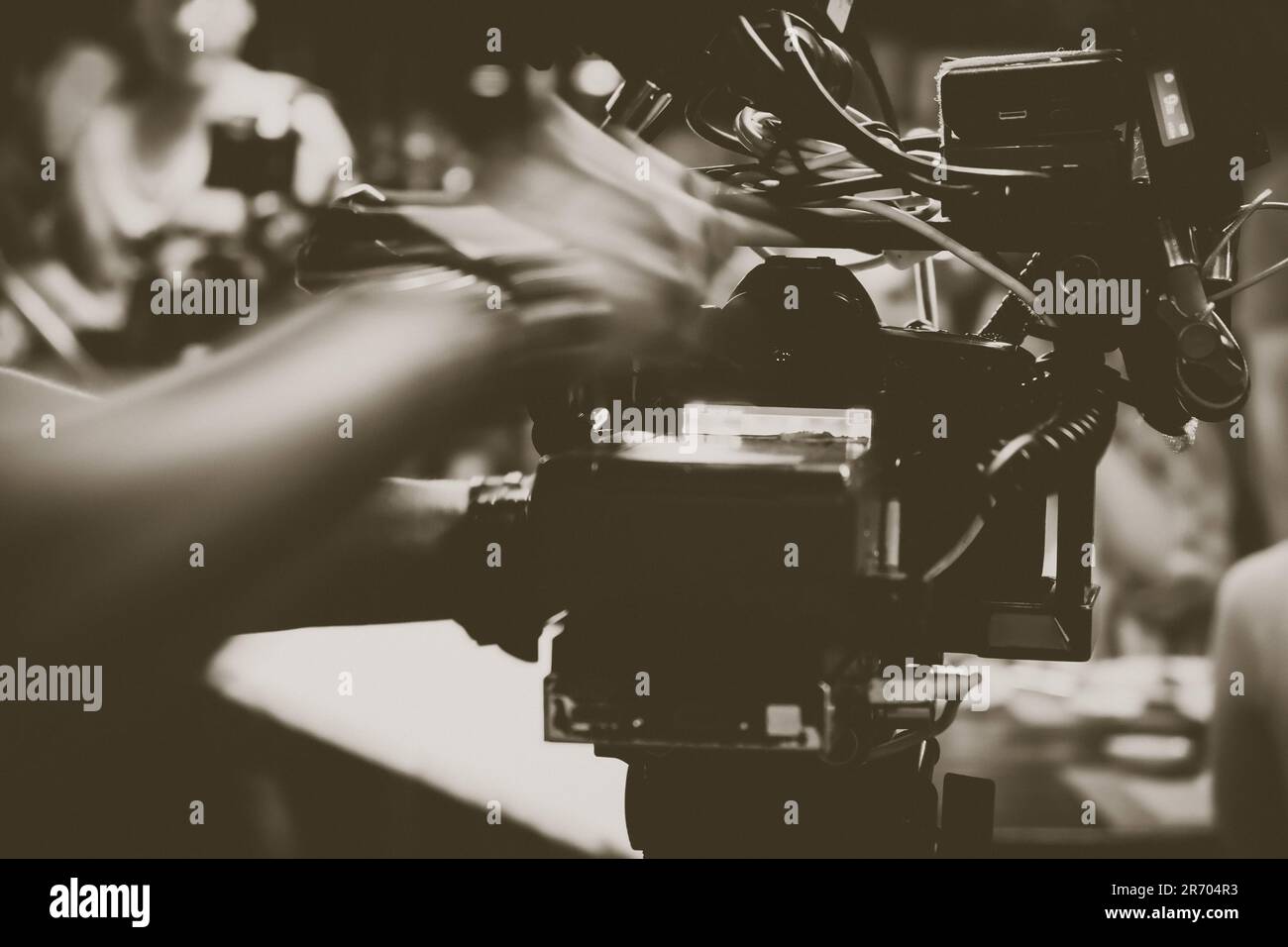 cinema video camera on tripod in film studio. Filmmaking equipment ...