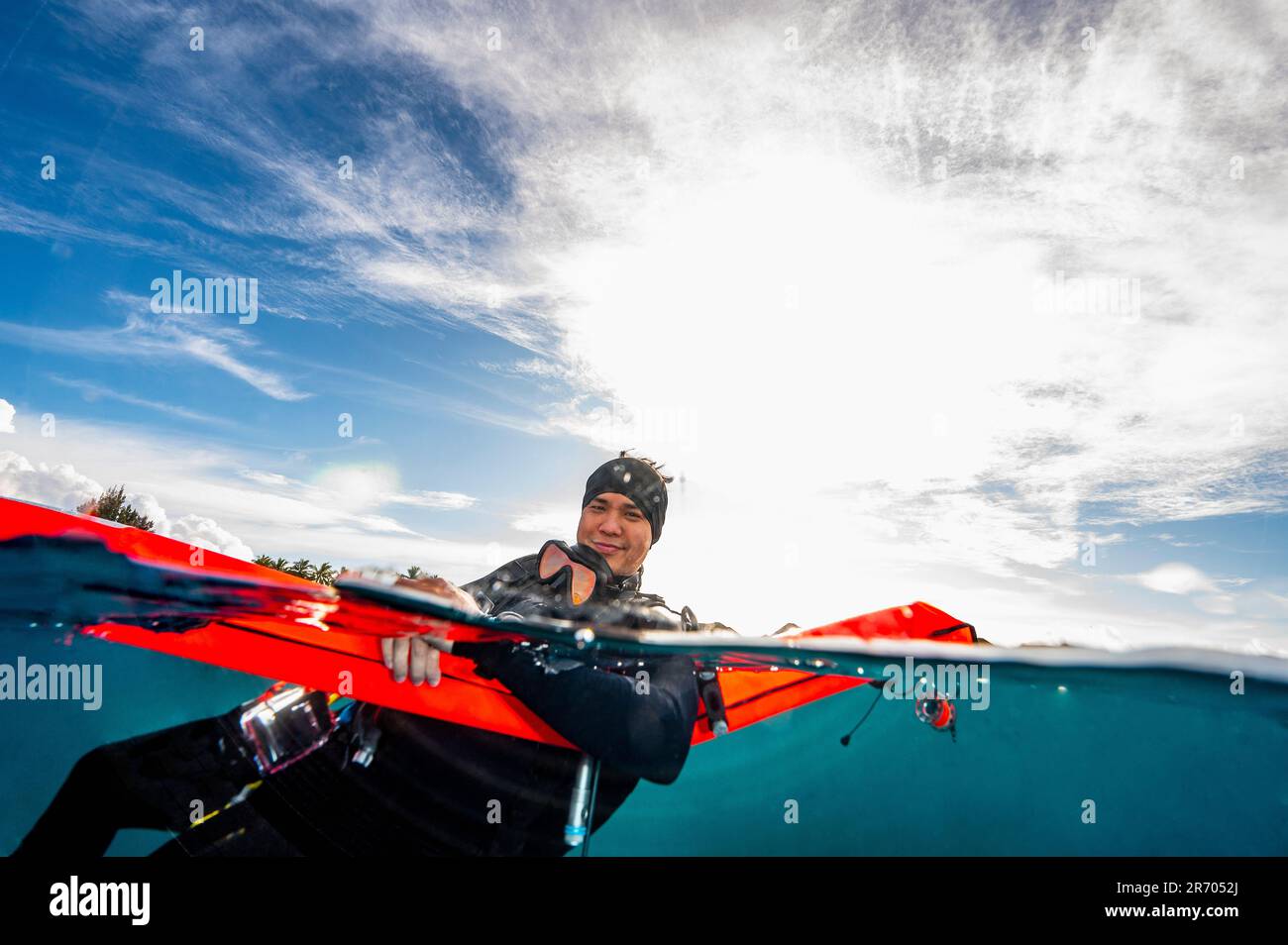 diver floating on the surface after a dive in the Maldives Stock Photo ...