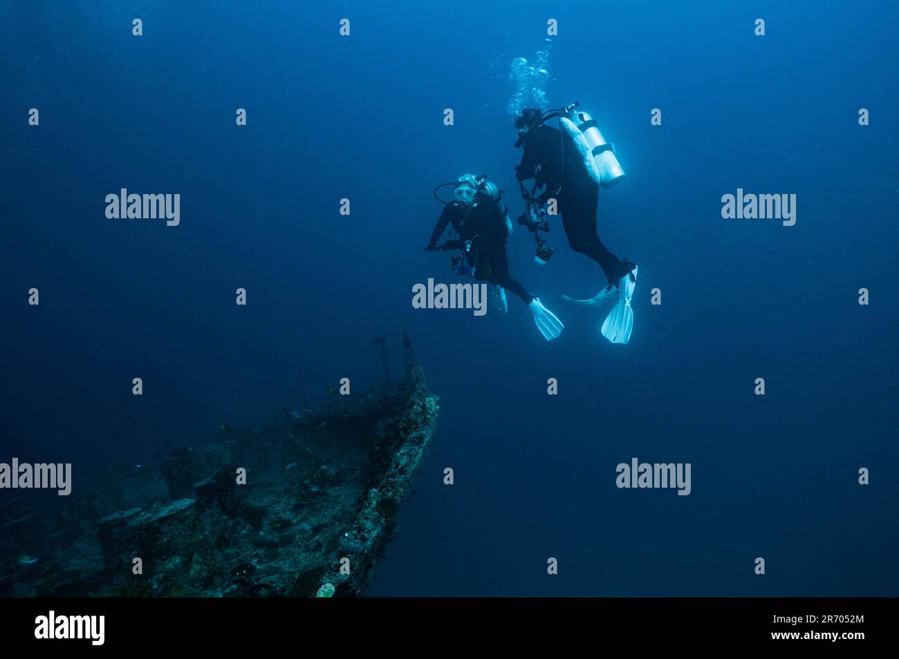 divers exploring shipwreck in the Maldives Stock Photo - Alamy