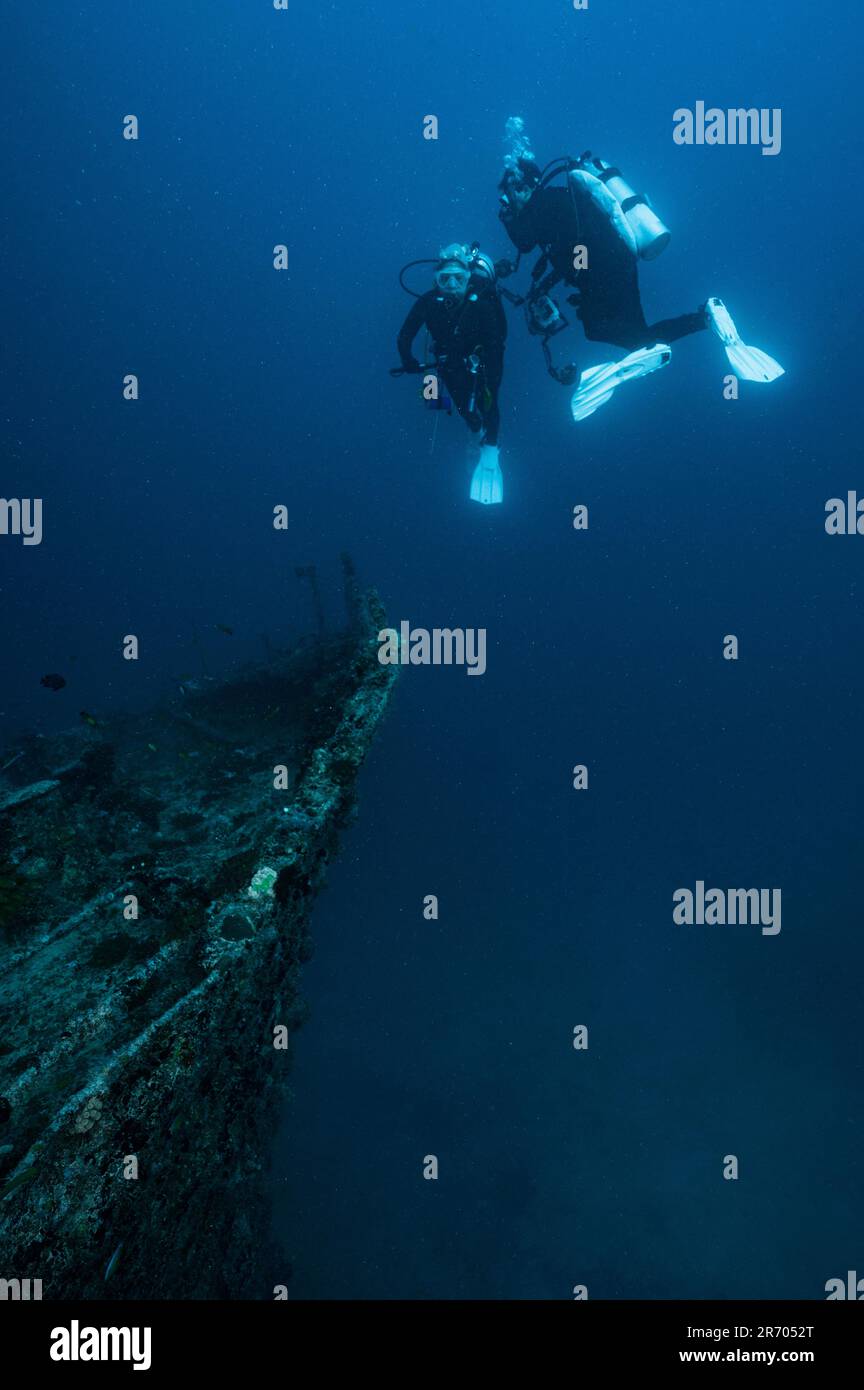divers exploring shipwreck in the Maldives Stock Photo - Alamy