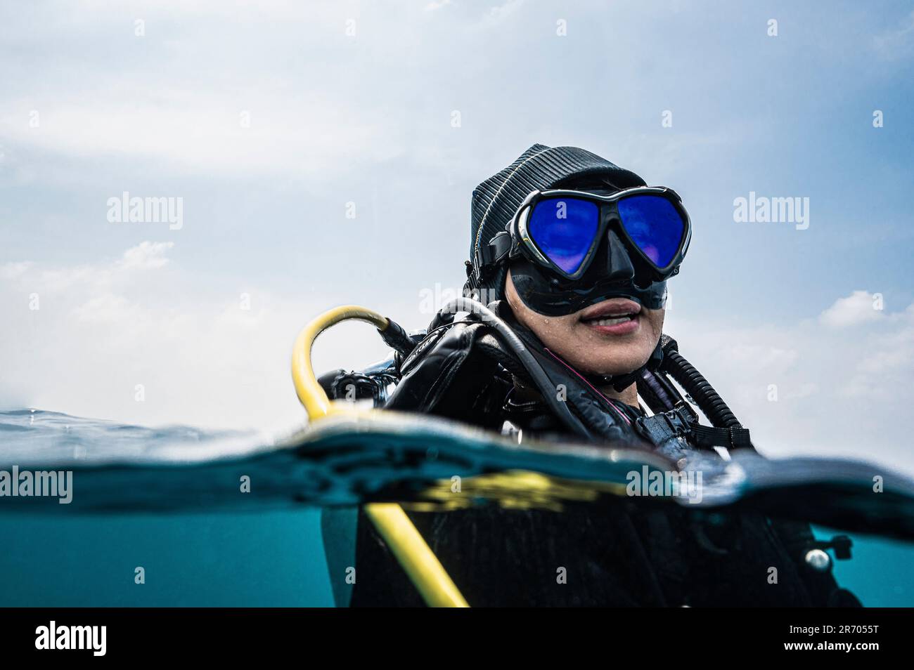diver floating on the surface after a dive in the Maldives Stock Photo ...
