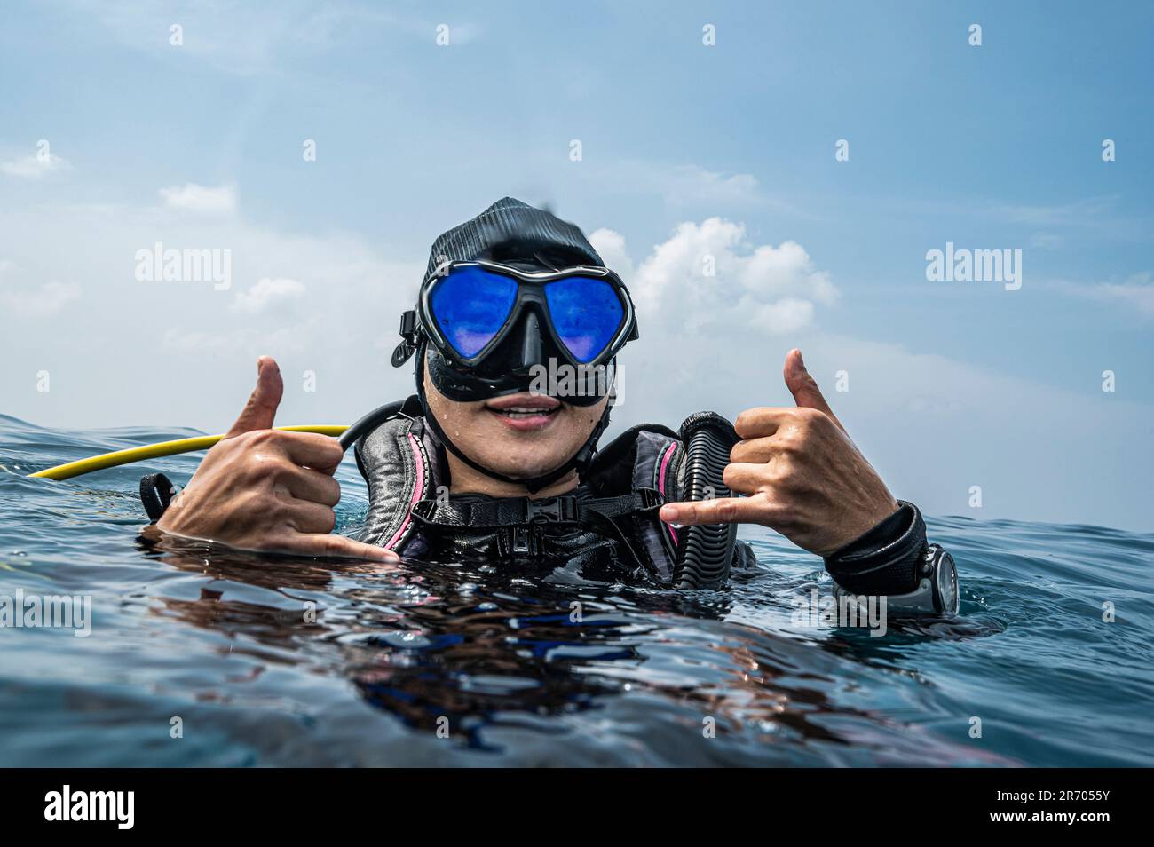 diver floating on the surface after a dive in the Maldives Stock Photo ...