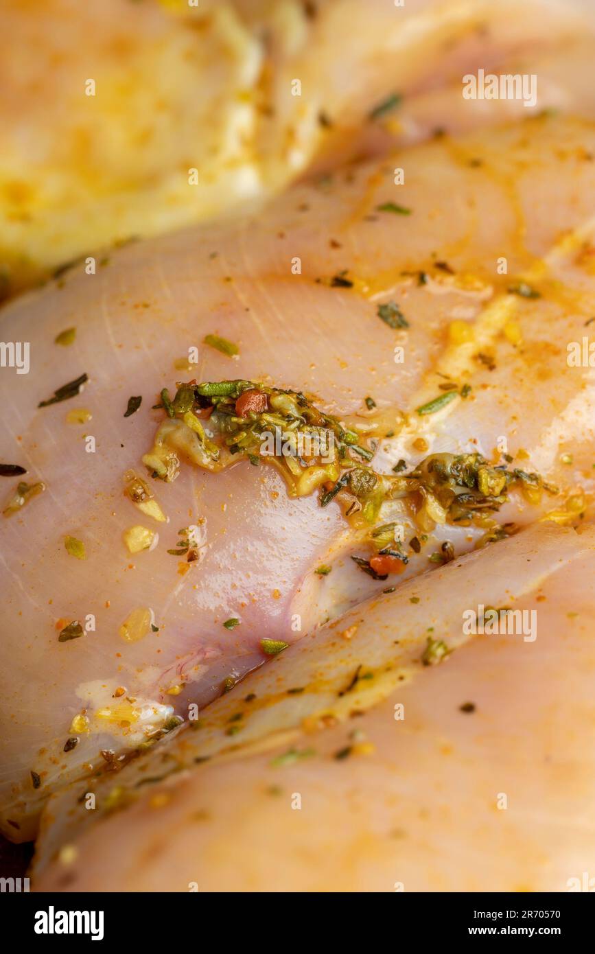 Freshly washed and skinned chicken meat, chicken fillets with salt and ...