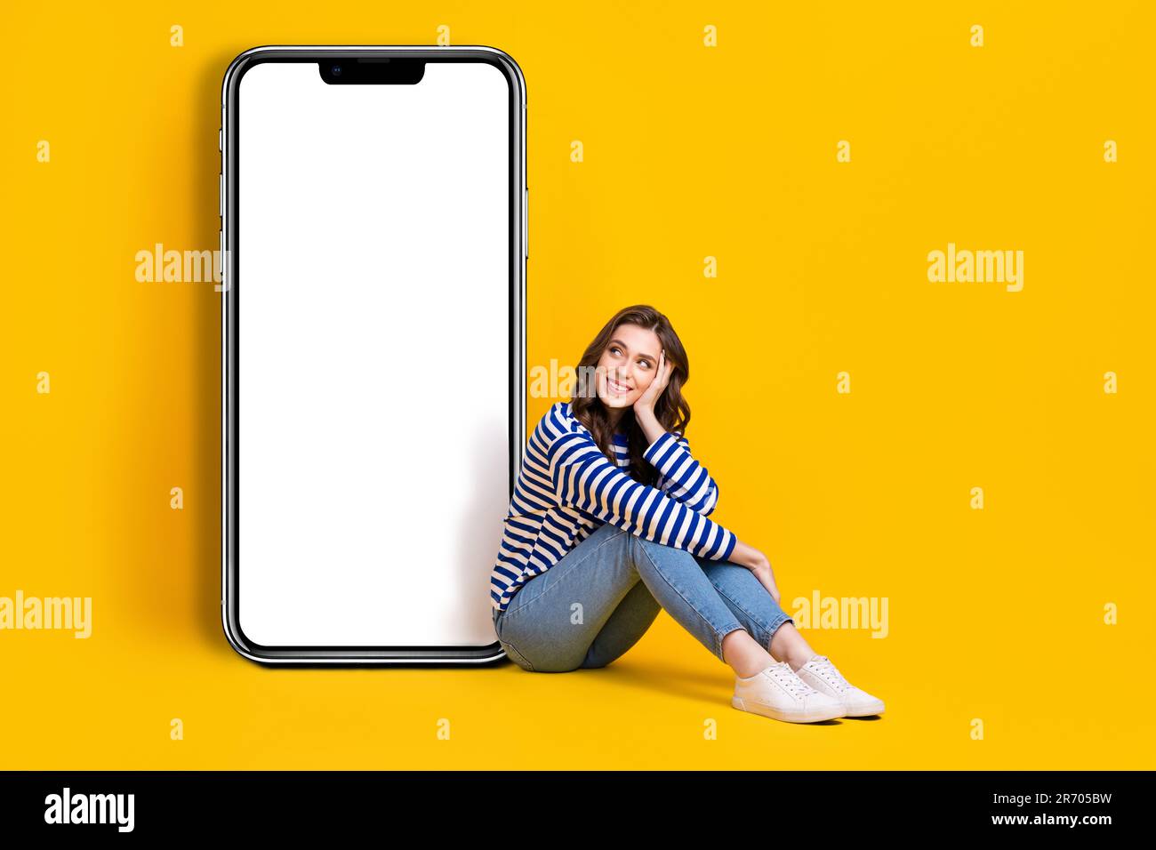 Full length portrait of pretty cheerful person sit floor look empty ...