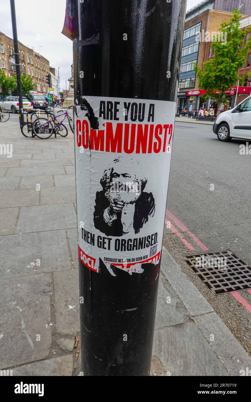 "Are you a communist, then get organized," flyer attached to pile ...