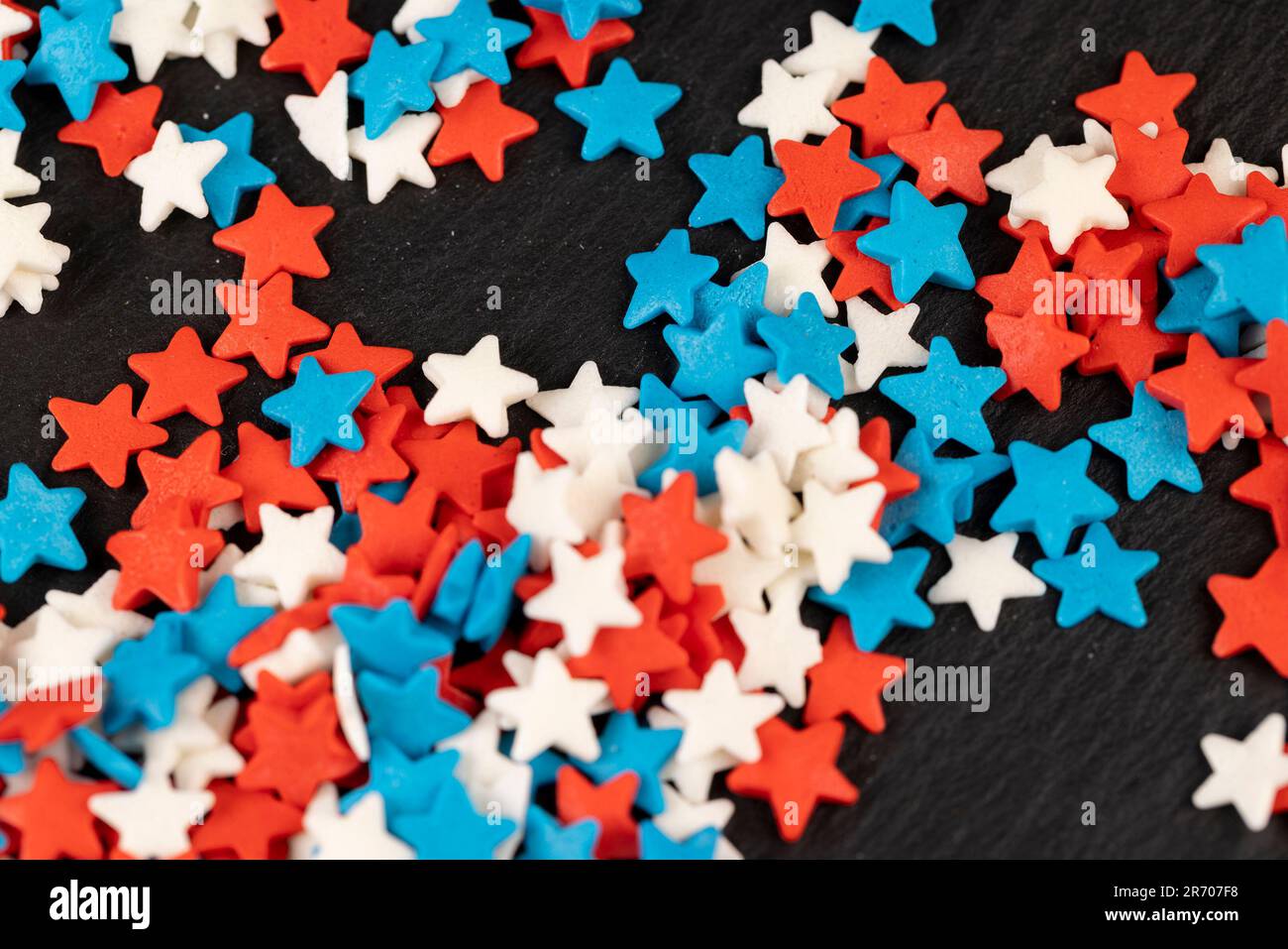 red, white and blue star-shaped candies for decorating cakes and other ...