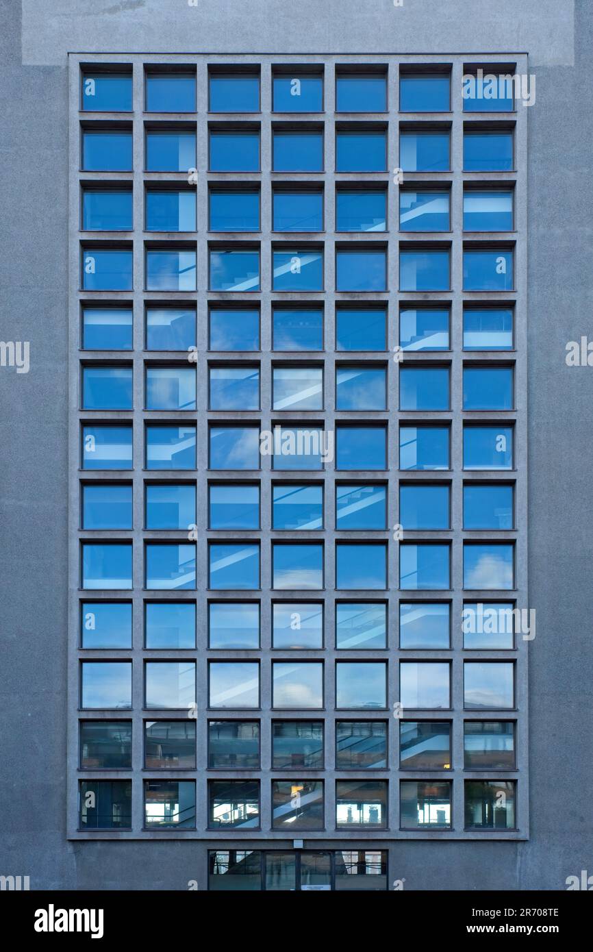 Multiple small windows on building Stock Photo - Alamy