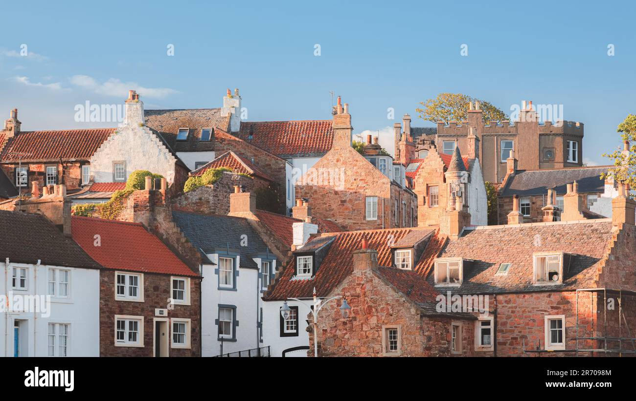 Quaint red brick buildings, chimneys, and rooftops in the historic ...