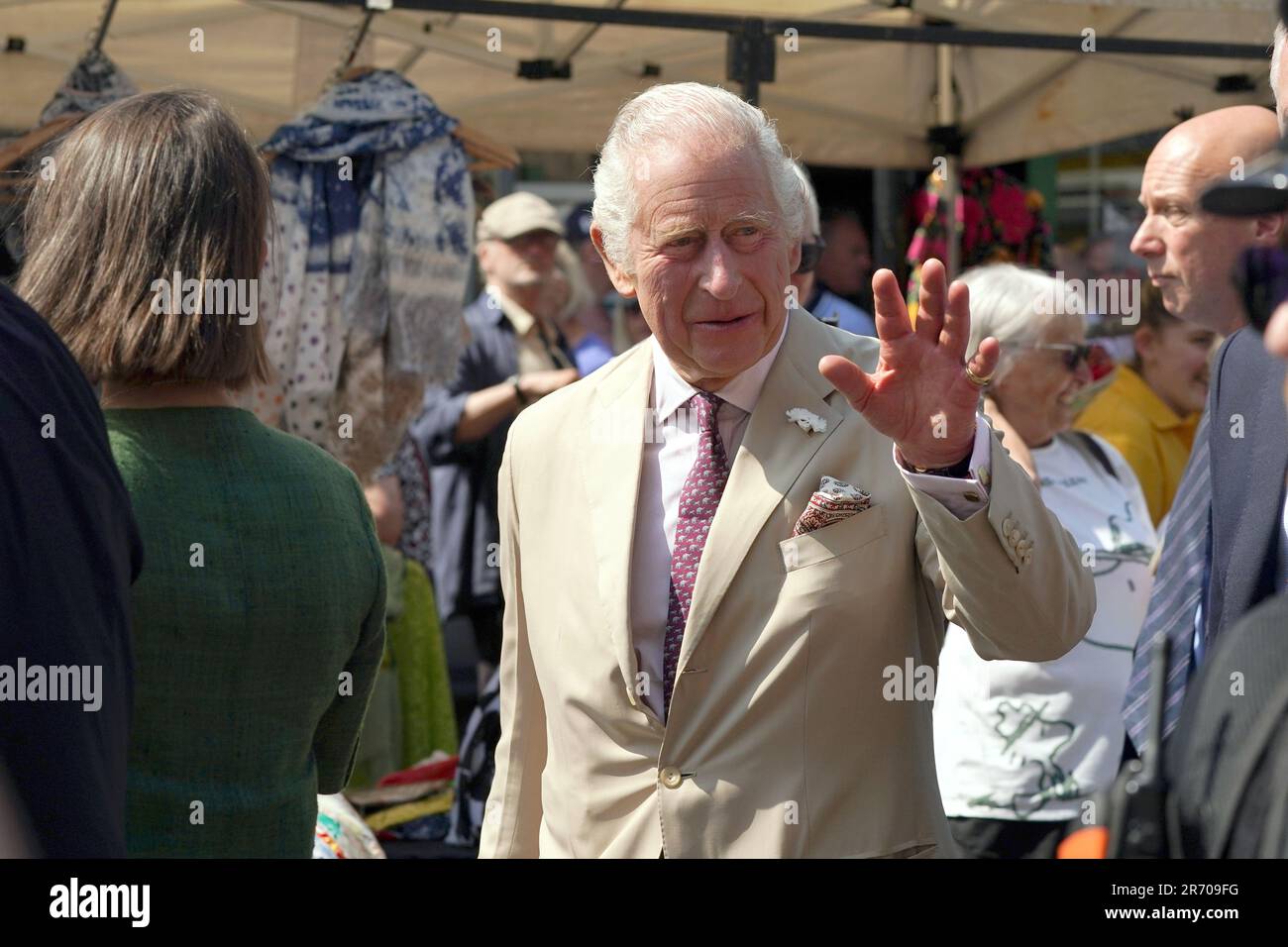 King Charles III waves during a visit to Pickering in Yorkshire, after ...