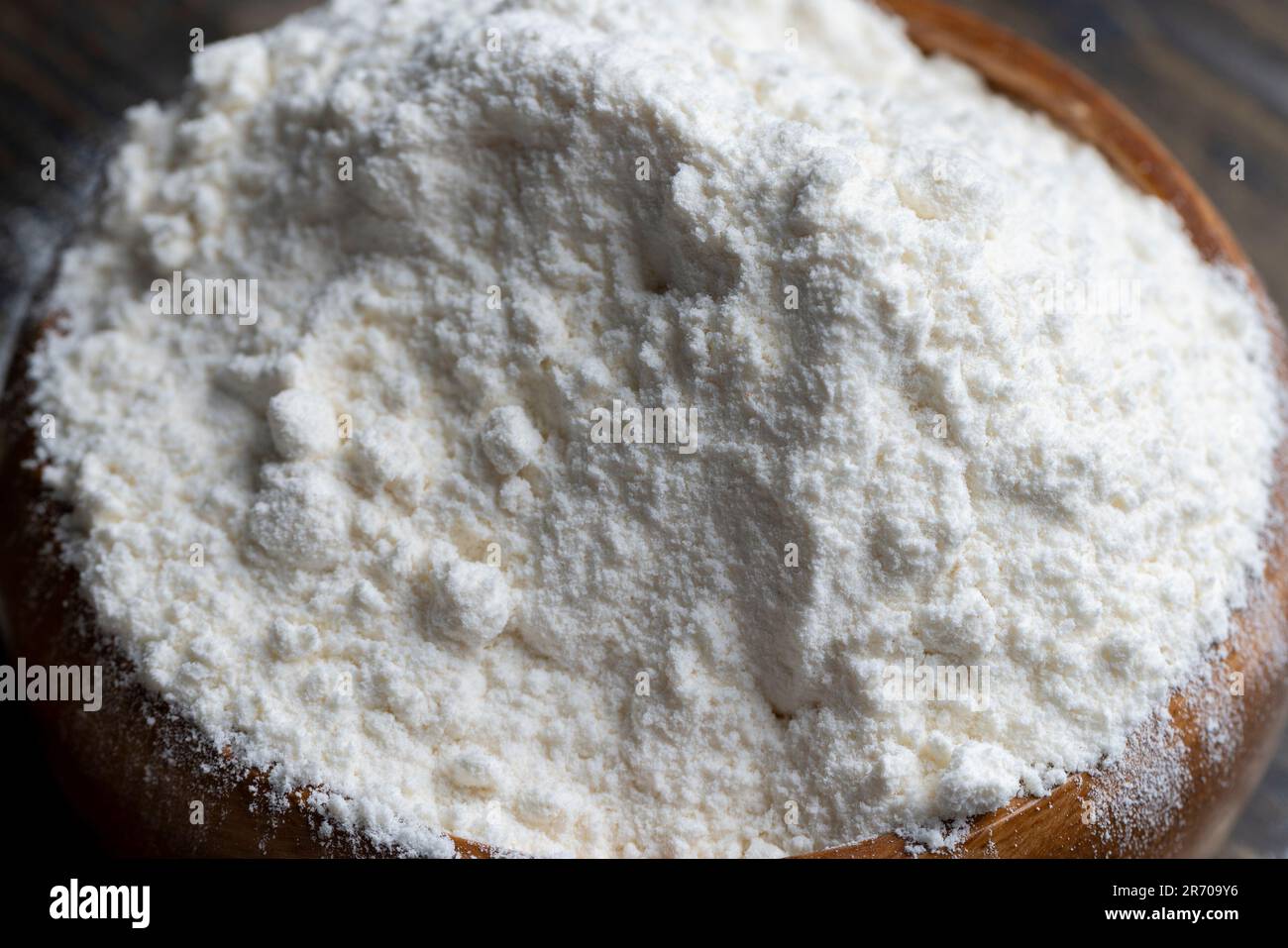 Wheat flour from a wooden bowl, fine white and pure wheat flour Stock ...