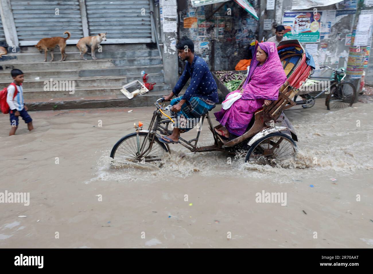 Dhaka, Bangladesh - June 12, 2023: Vehicles try to drive through a ...