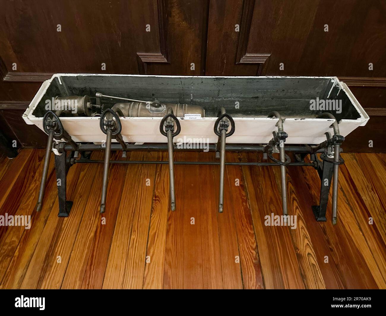 Vintage machine to fill wine bottles in the National Museum of Wine ...