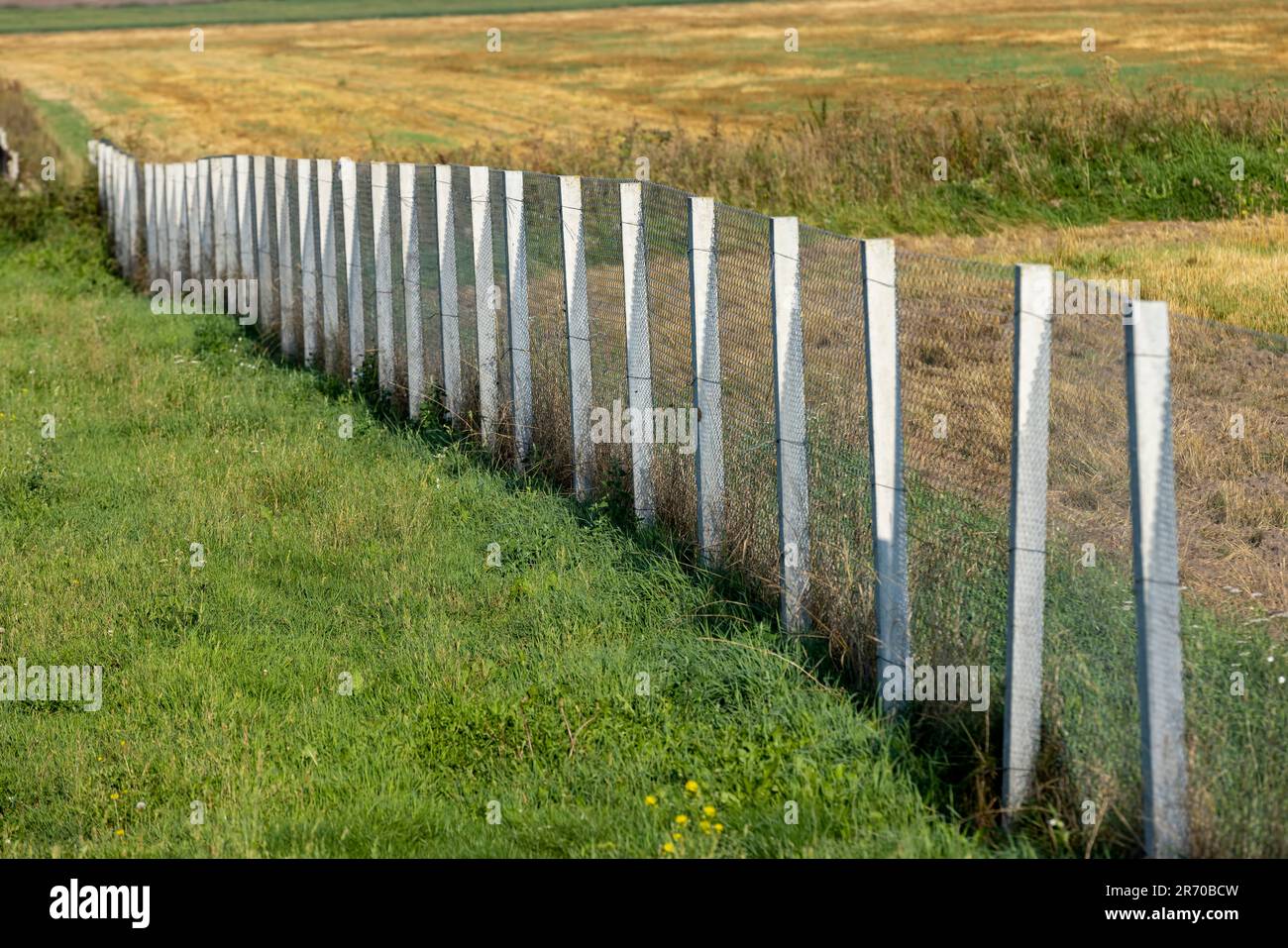 Metal fence to ensure security, delineation of the territory of ...