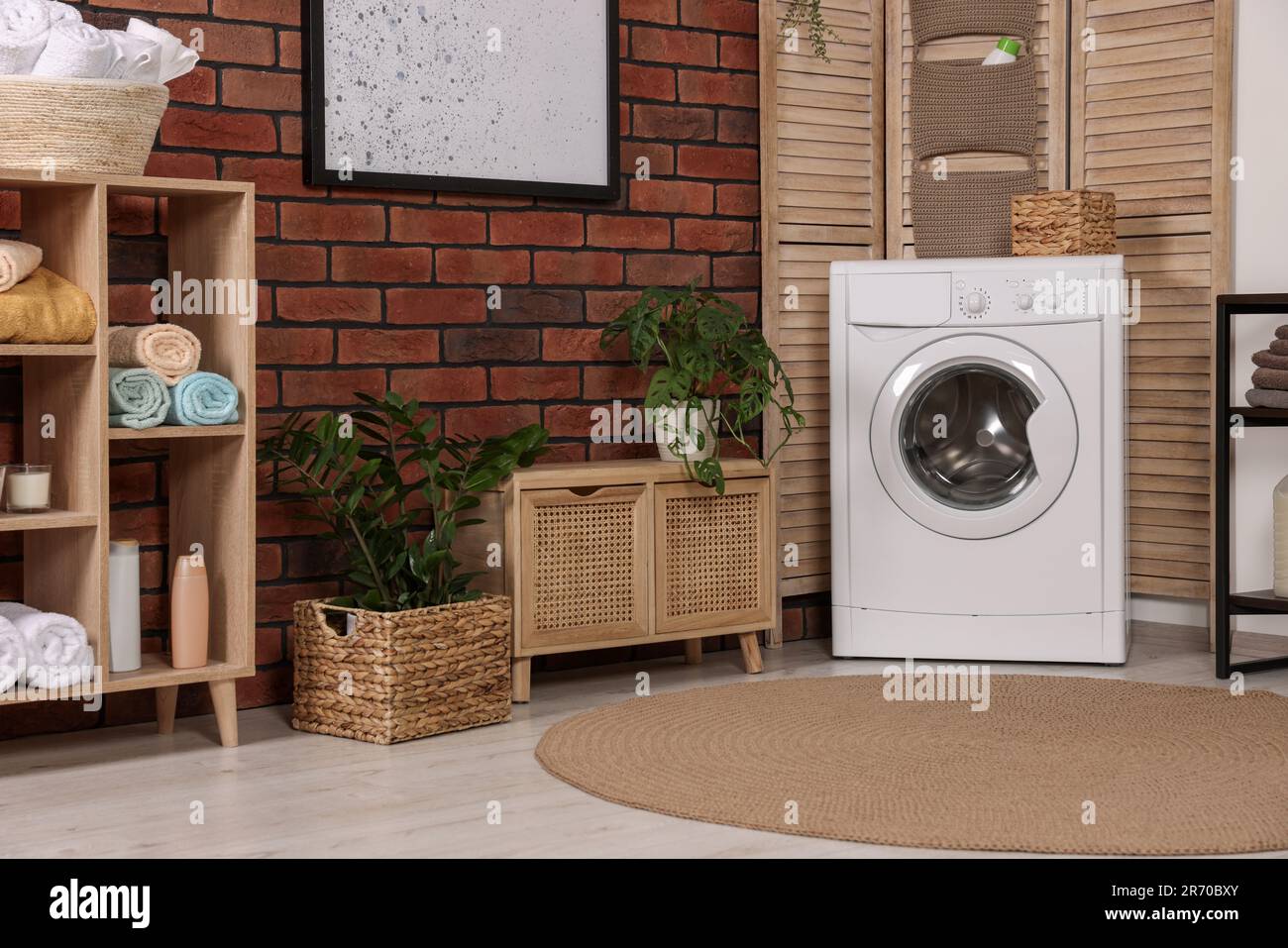 Stylish laundry room with washing machine. Interior design Stock Photo ...