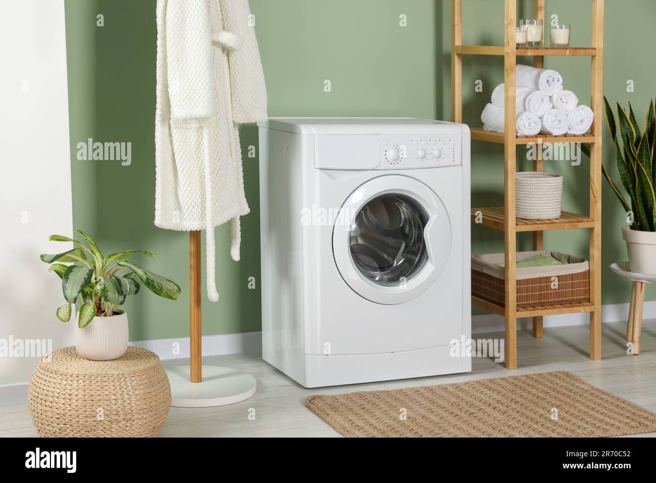 Stylish laundry room with washing machine. Interior design Stock Photo ...