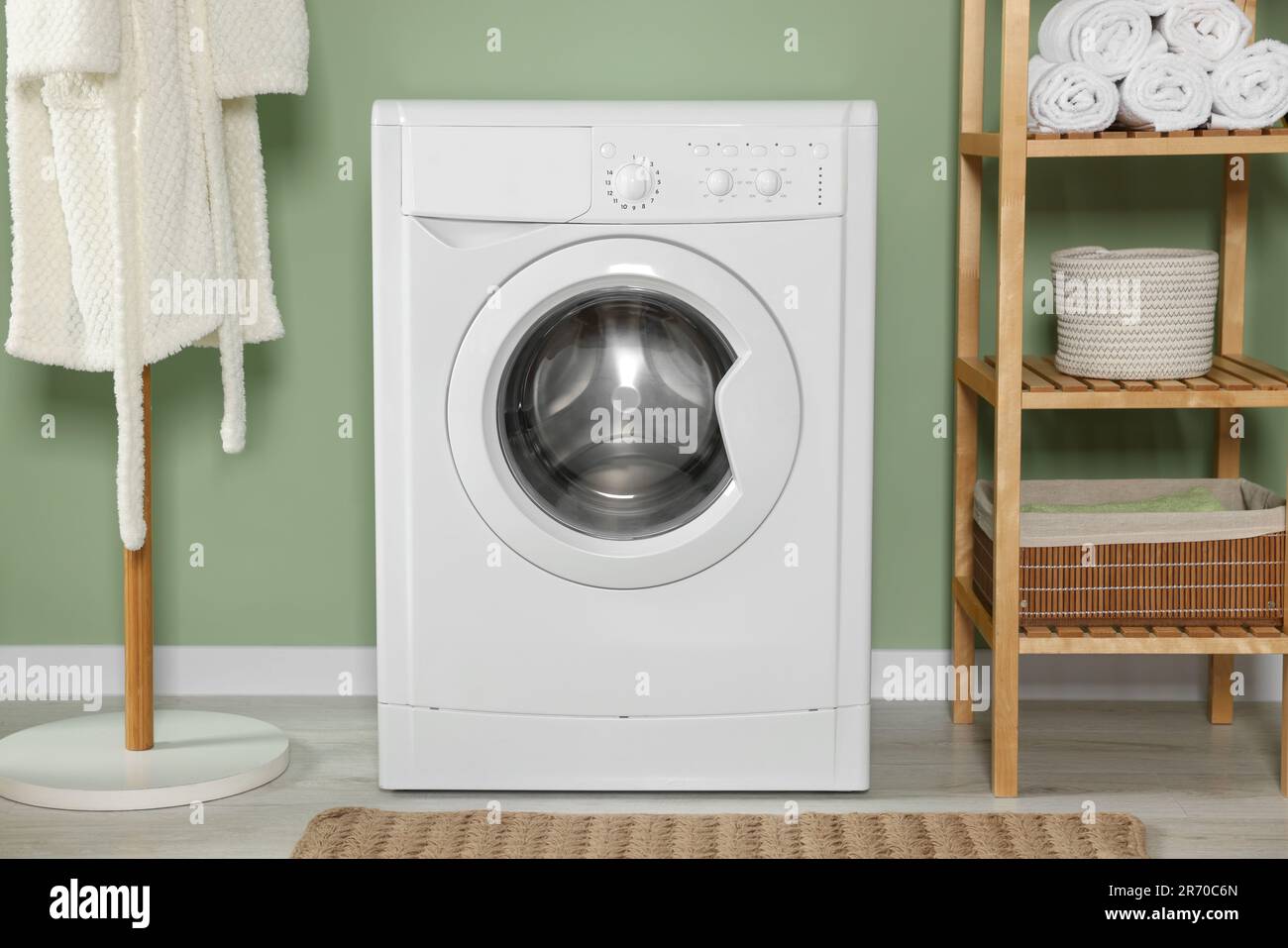 Stylish laundry room with washing machine. Interior design Stock Photo ...