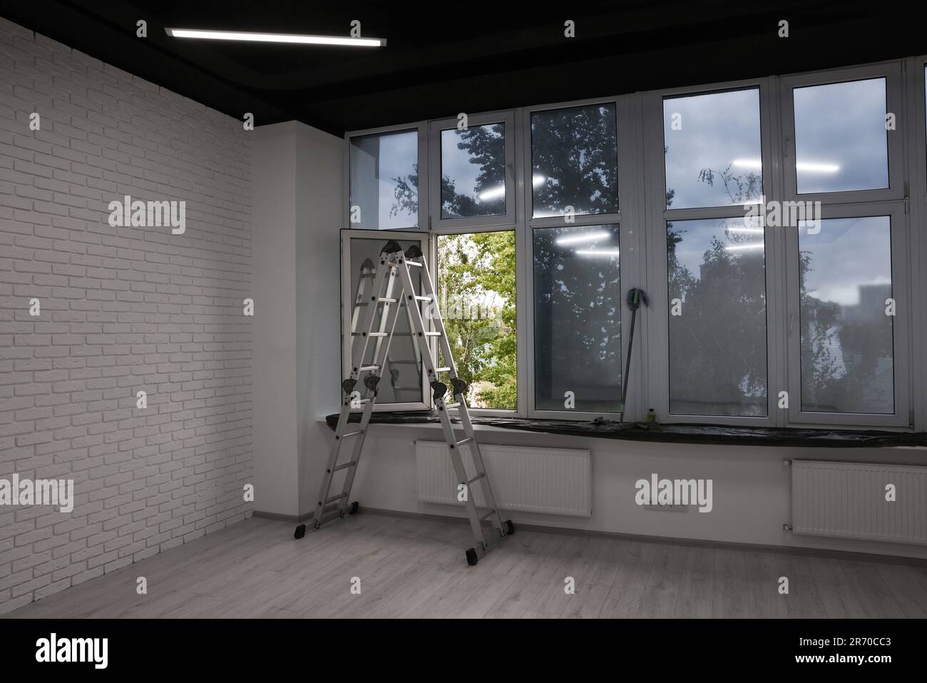 Construction ladder in white room hi-res stock photography and images ...