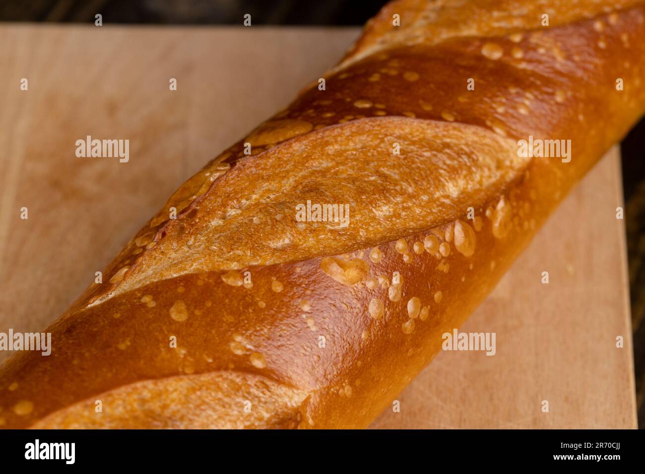 French long bread made of wheat flour, fresh baguette close-up Stock ...