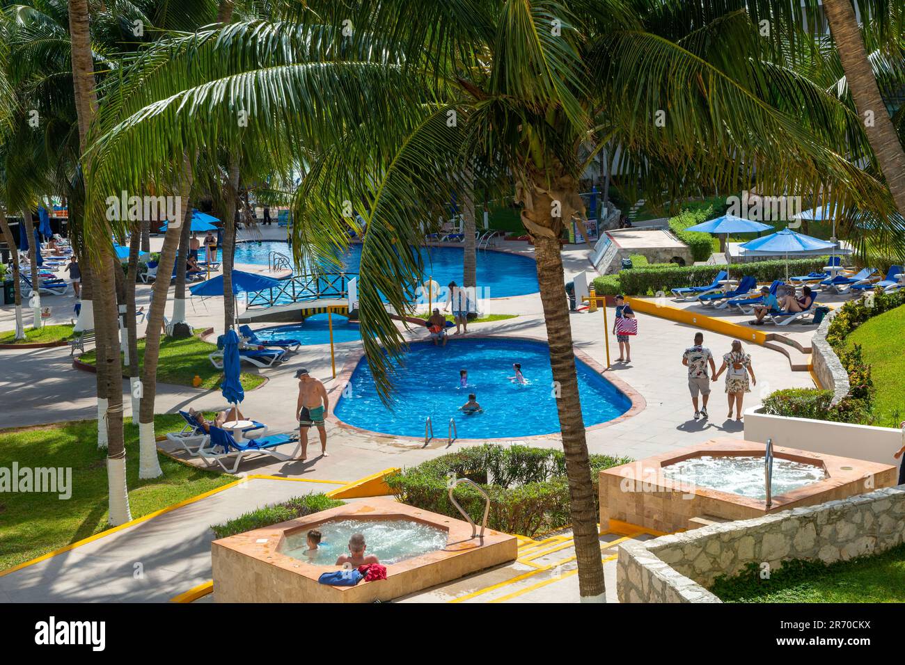 Swimming pools and palm trees at Hotel Casa Maya, Cancun, Quintana Rood ...