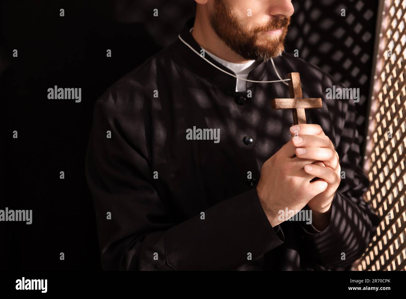 Orthodox priest holding holy cross hi-res stock photography and images ...
