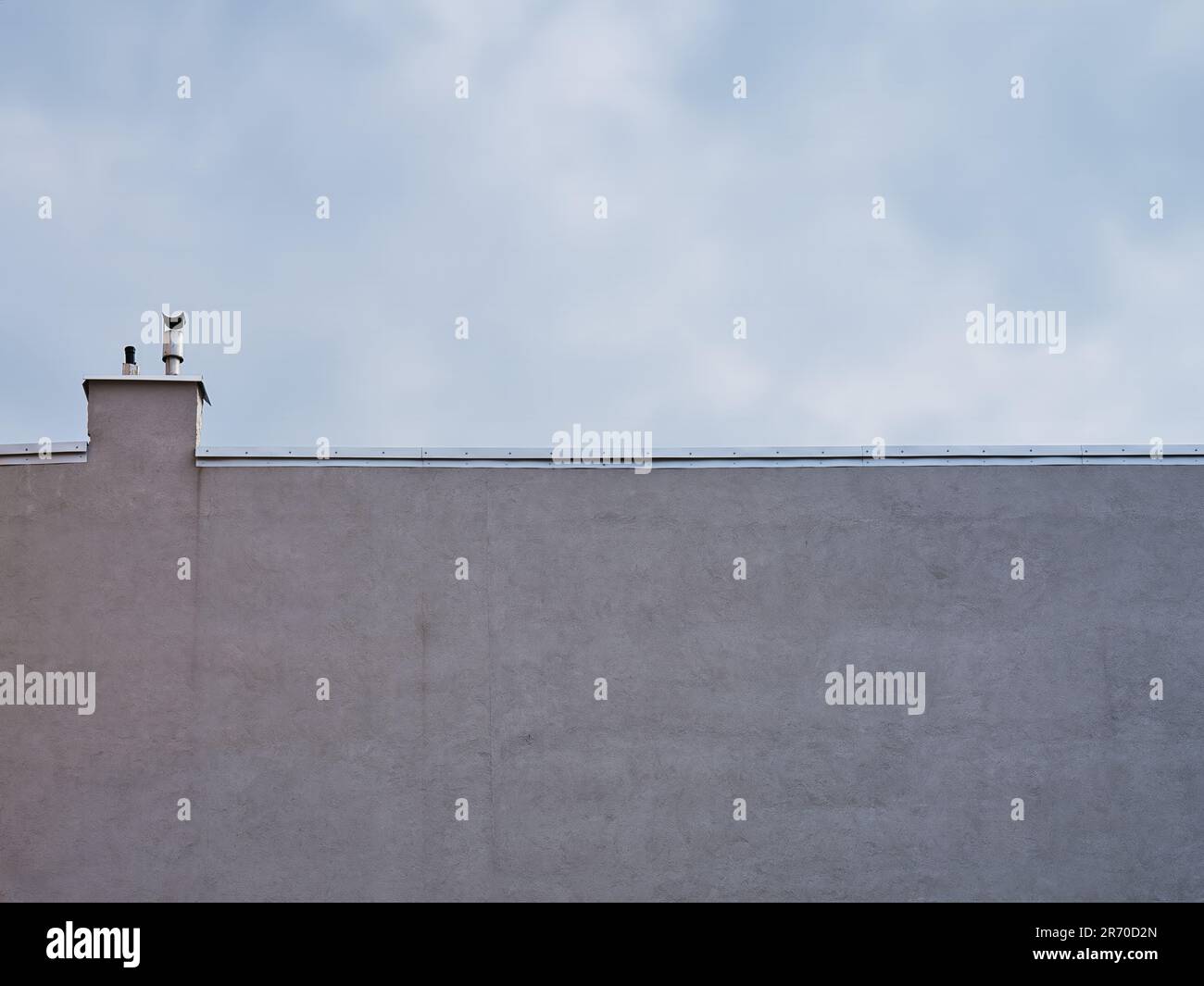 Blank wall, aluminum chimney and sky, minimalism Stock Photo - Alamy