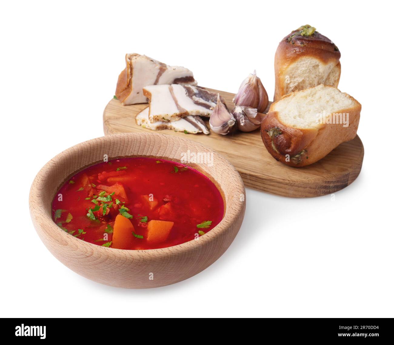 Delicious borsch served with pampushky and salo on white background ...