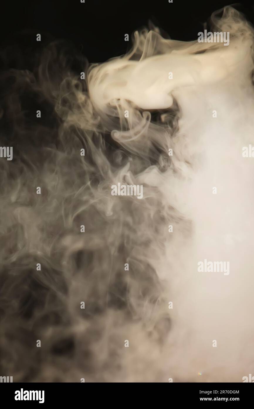 Dramatic background with thick puffs of smoke Stock Photo - Alamy