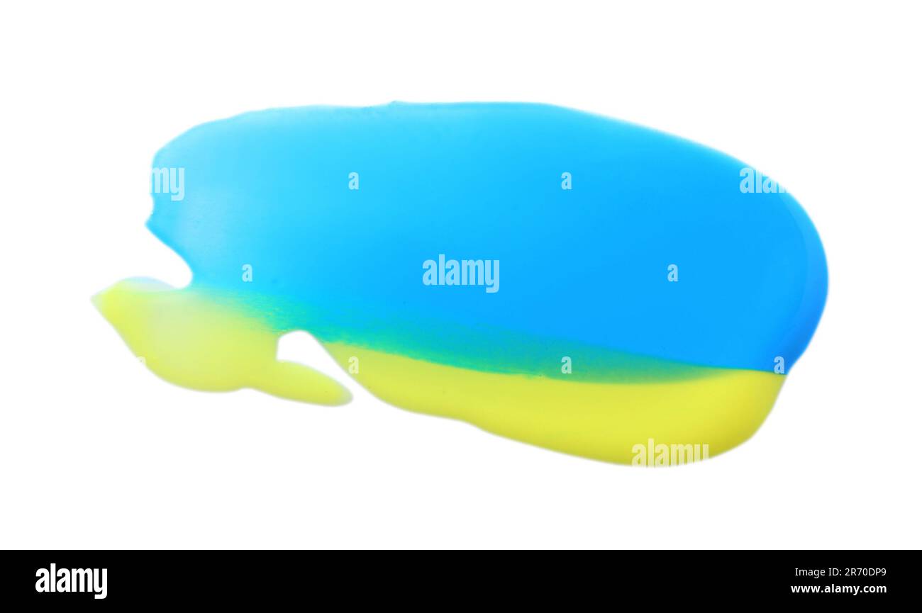 Light blue and yellow paint samples on white background, top view Stock ...