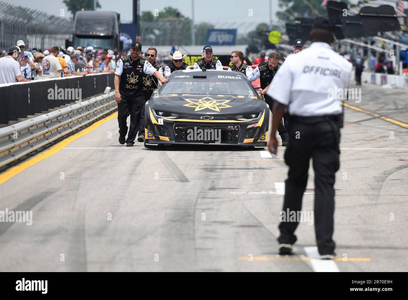 MADISON, IL - JUNE 04: An official looks on as the crew pushes the car ...