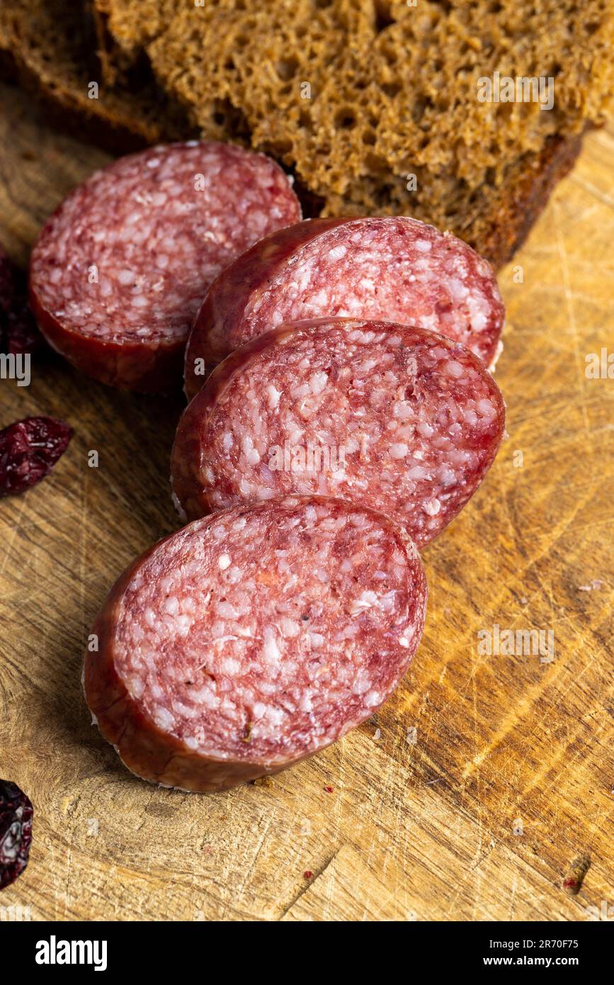 Sausage of moose meat cut into pieces, preparation of snacks from wild ...