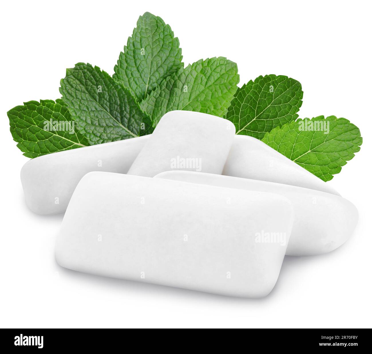 Menthol chewing gum pillows and mint leaves on white background Stock ...