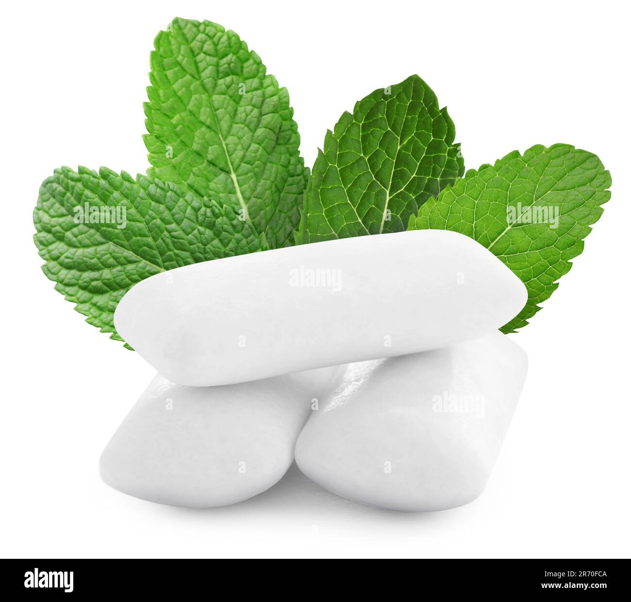 Menthol chewing gum pillows and mint leaves on white background Stock ...