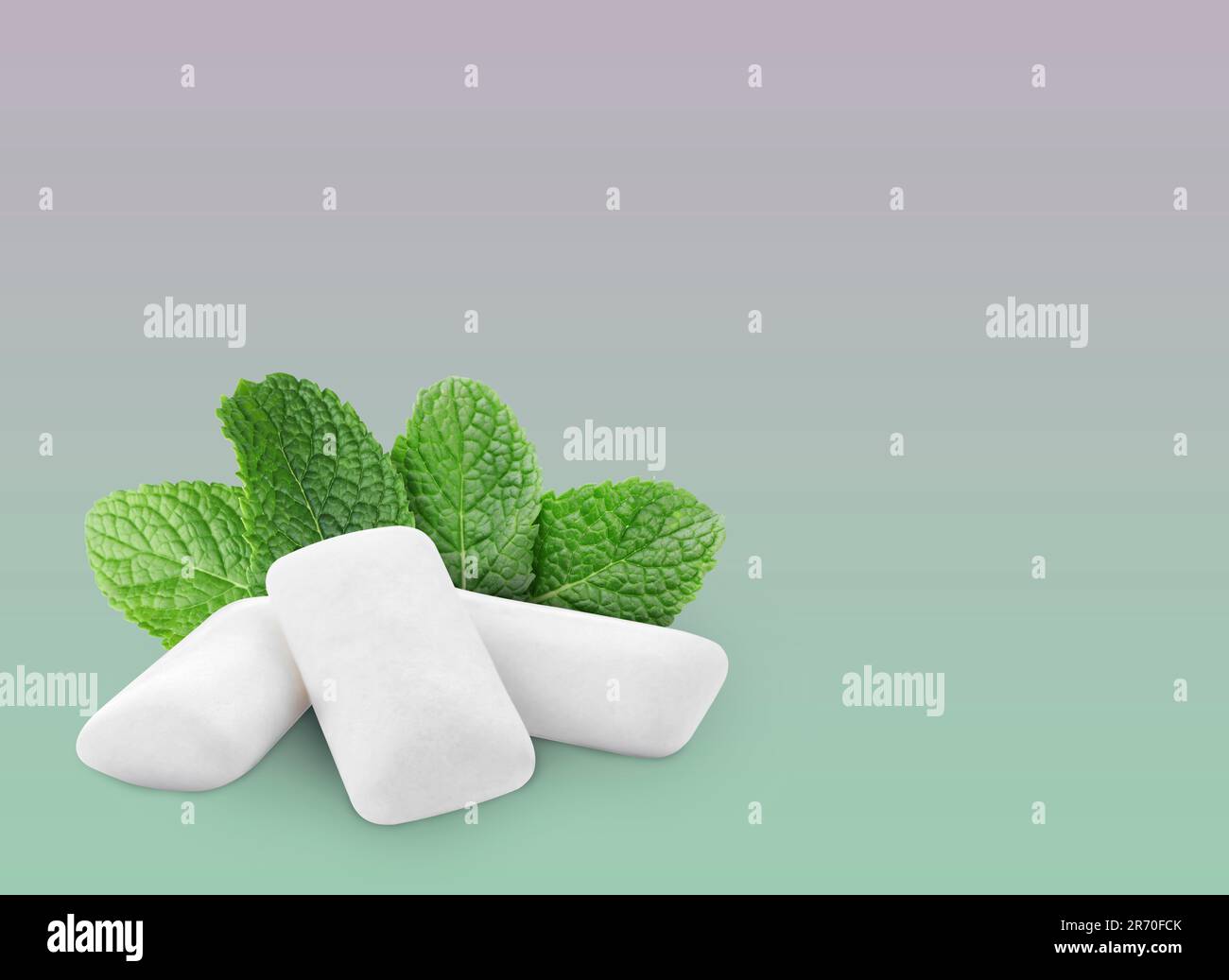 Menthol chewing gum pillows and mint leaves on color gradient ...