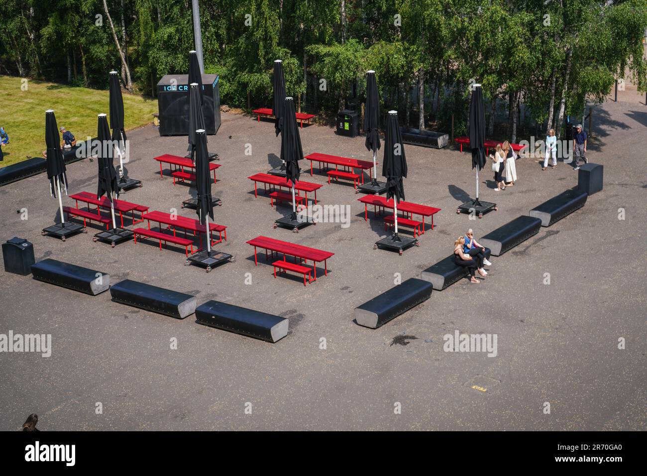 London UK. 12 June 2023 .A view of benches on London bankside on a hot ...