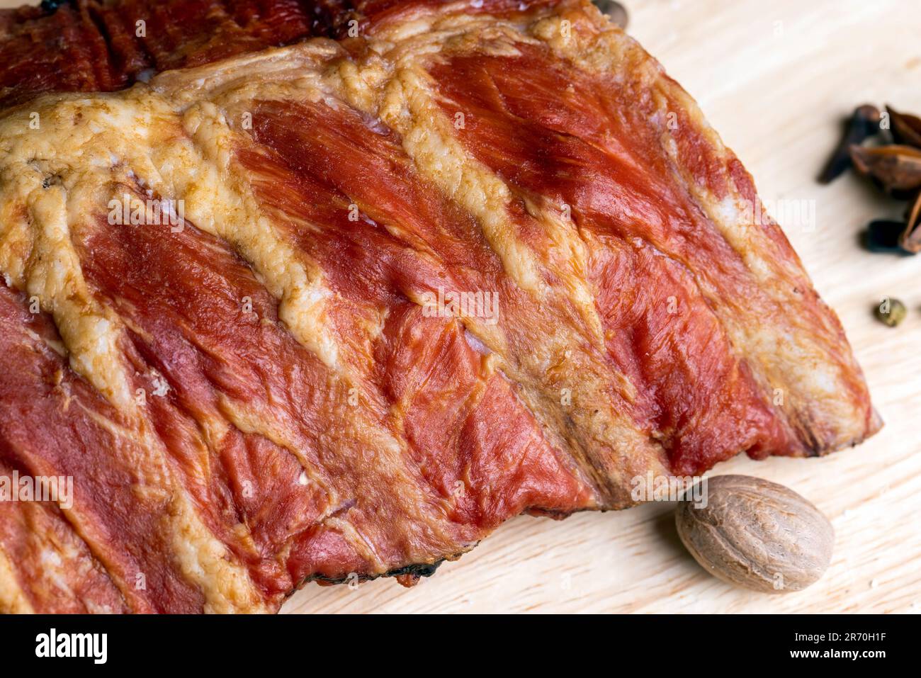 Boiled pork ribs with spices, cooked ribs on the kitchen table Stock ...