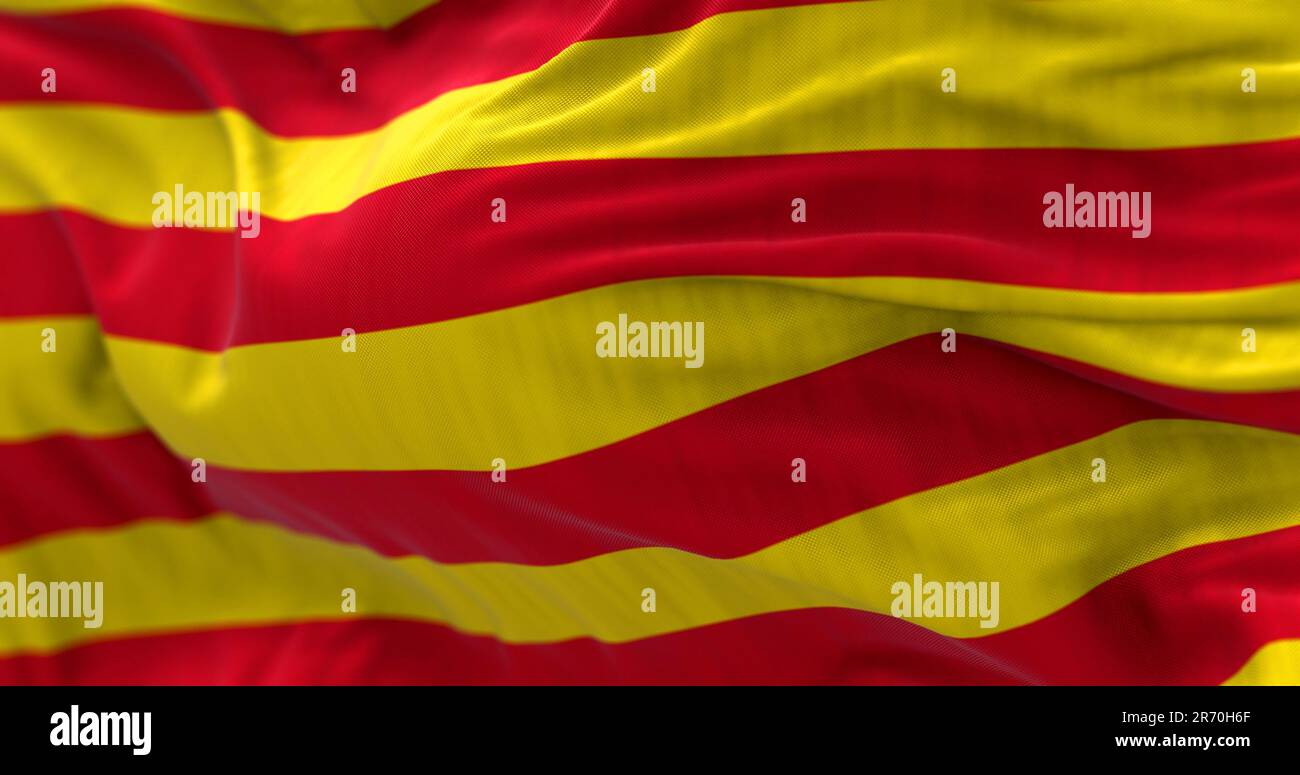 Detail of the Catalonia flag waving in the wind. Catalonia is an ...