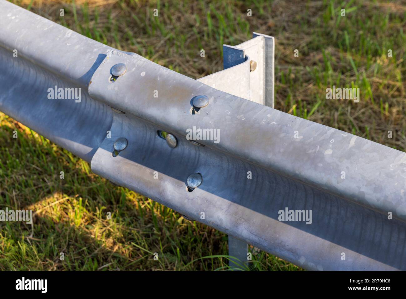Metal fencing on the highway for safety, steel fencing to protect ...