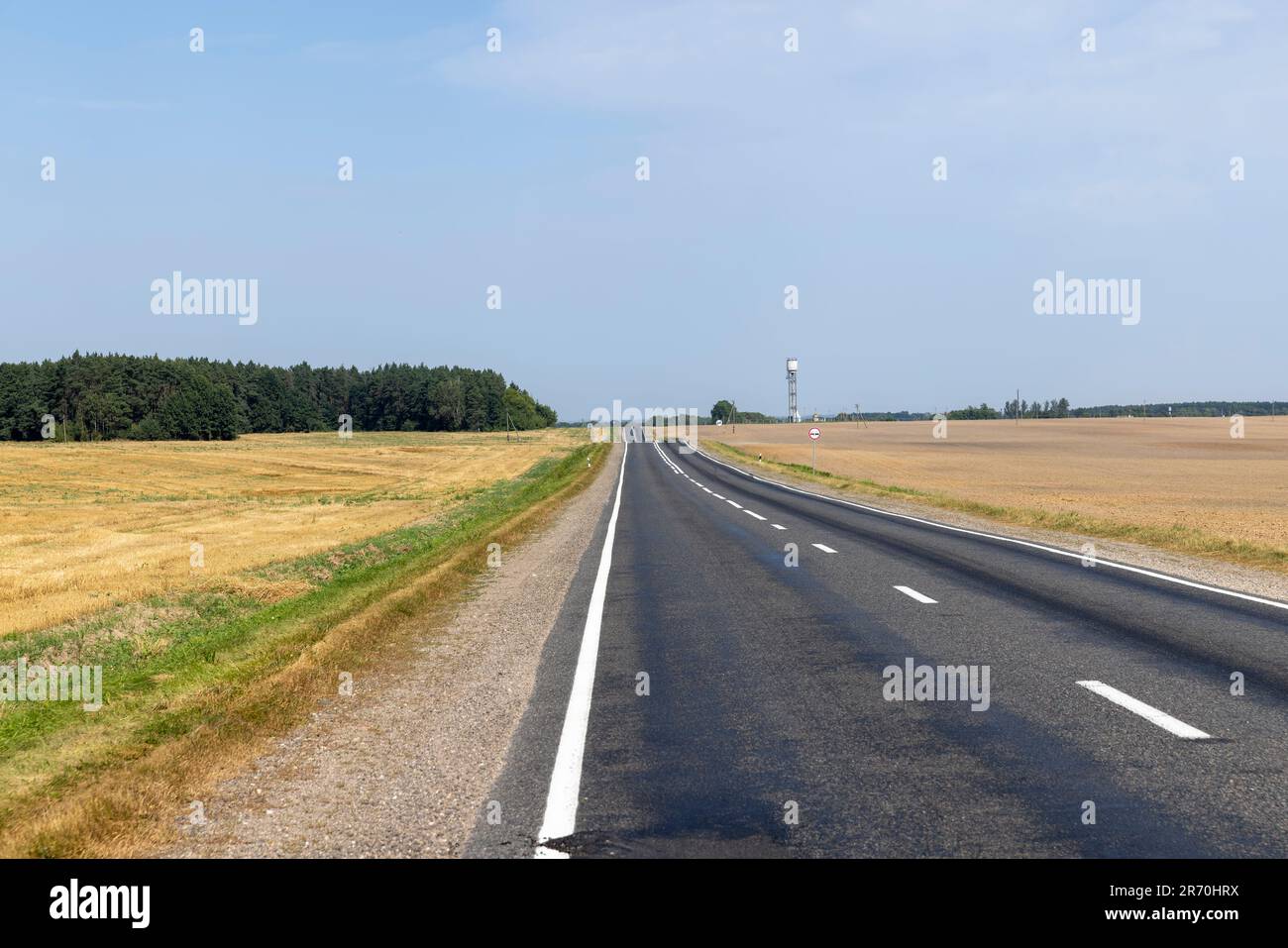 Narrow paved road for cars, part of a modern paved expressway for motor ...