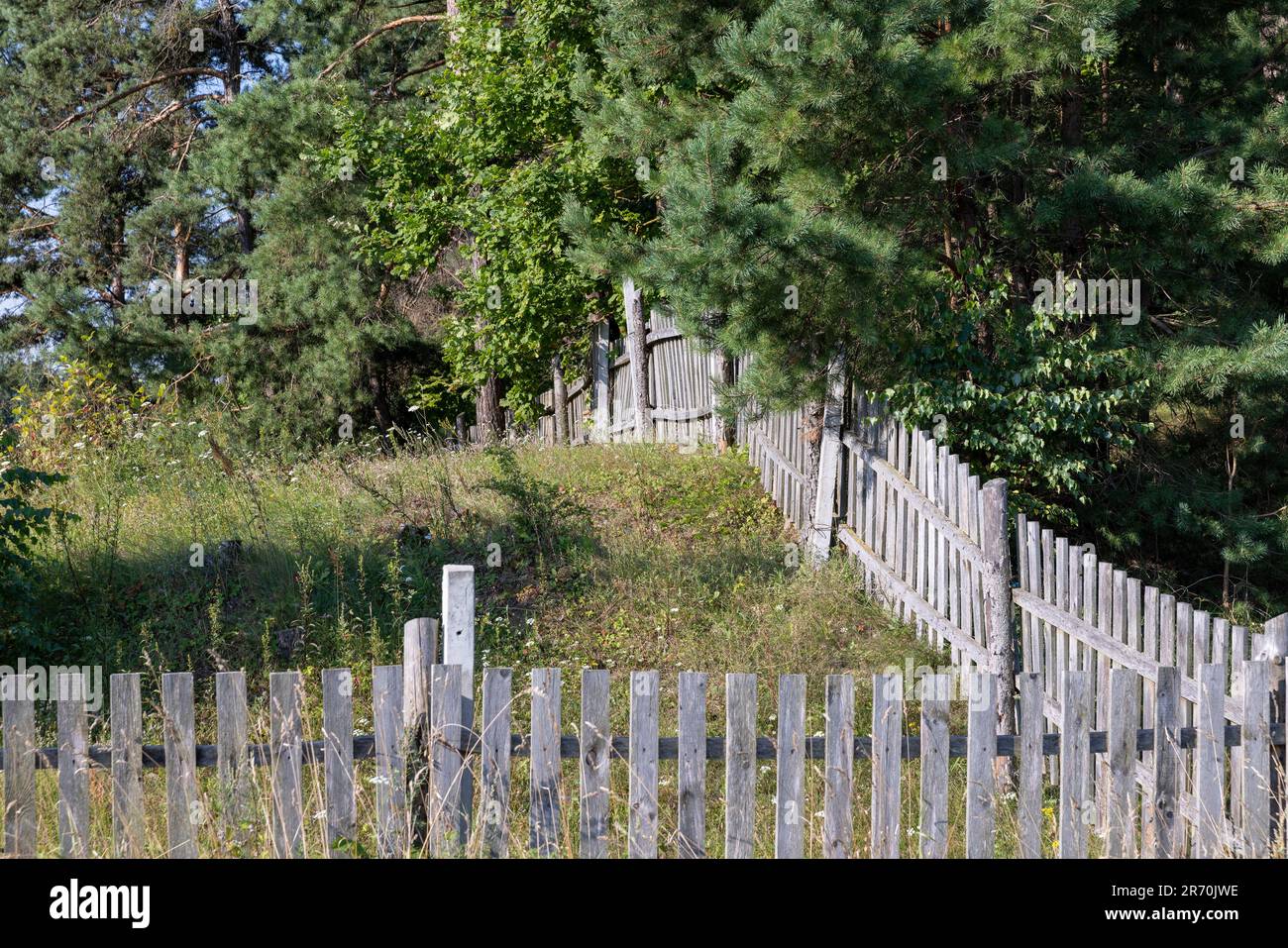 Wooden fence for security, delineation of the territory of different ...