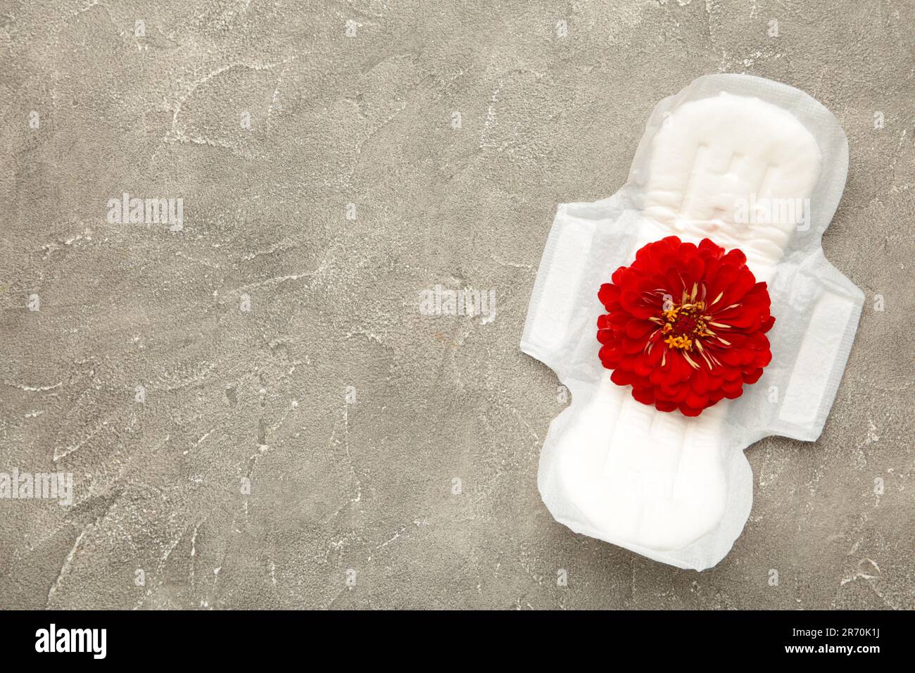 White sanitary pad, hygiene protection on a grey background ...