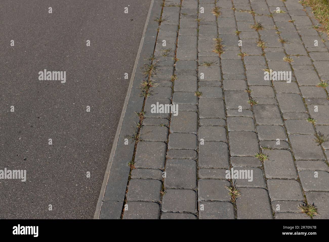 Concrete tile which paved part of the road for traffic, part of the ...