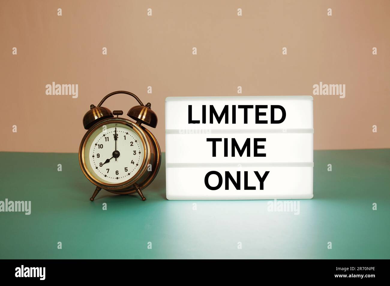 Limited time only text message on paper card with wooden easel and ...