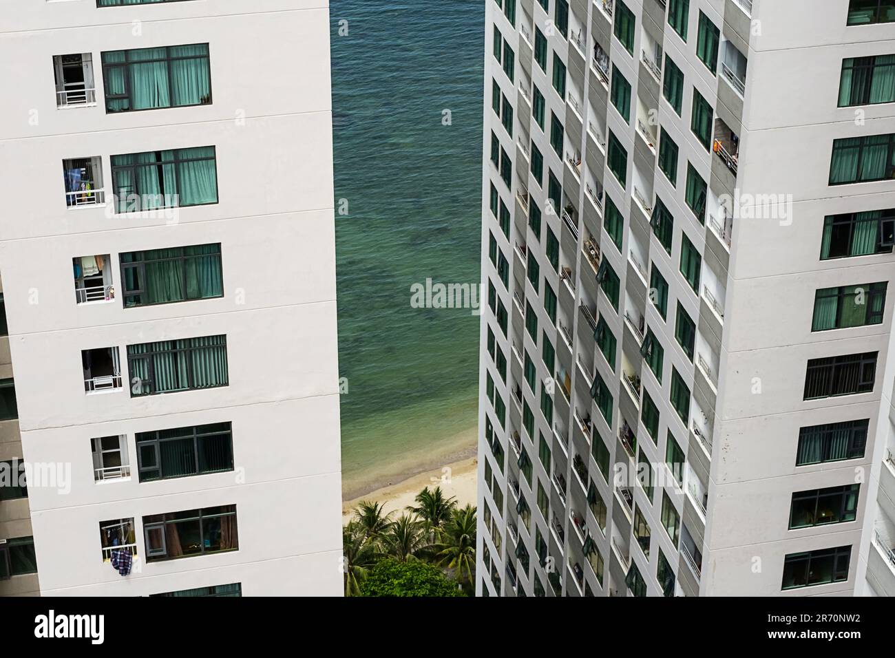 High rise apartment blocks on seashore. Modern multi storey residential ...