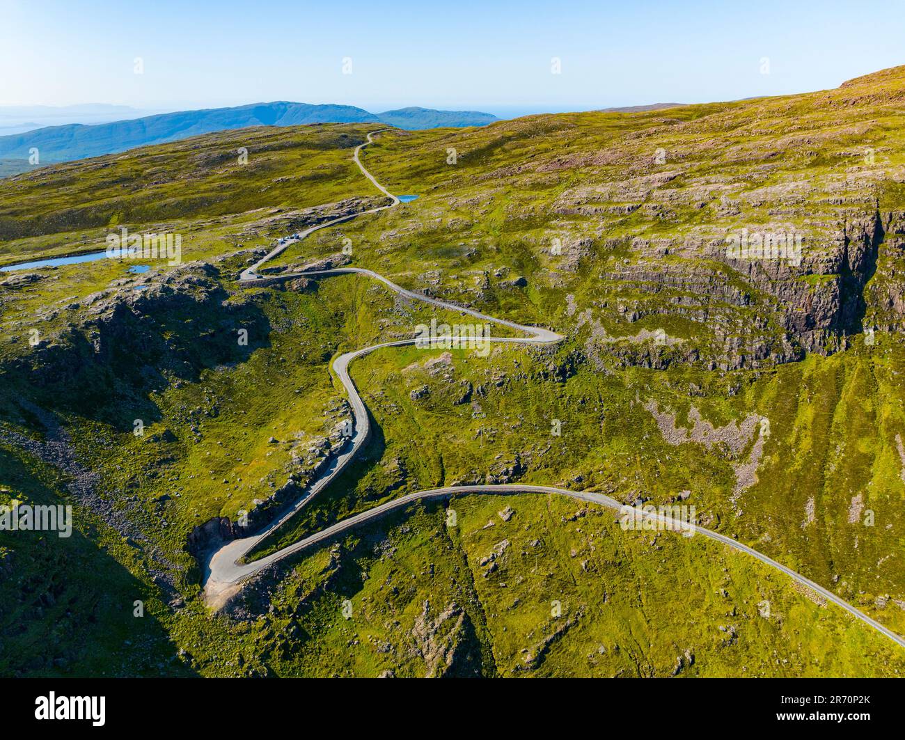 Aerial view of single track road passing through Bealach na Bà pass on ...