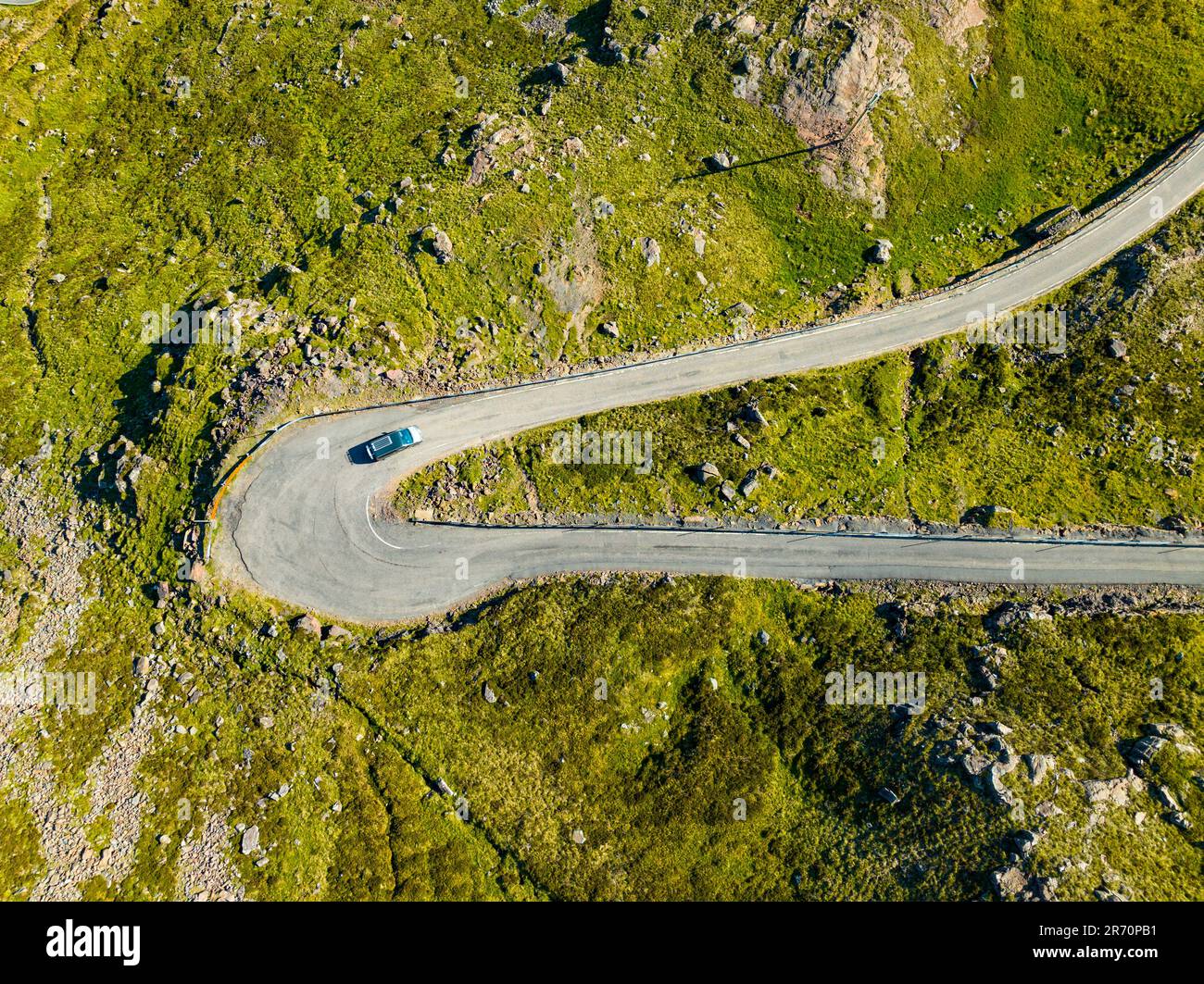 Aerial view of single track road passing through Bealach na Bà pass on ...