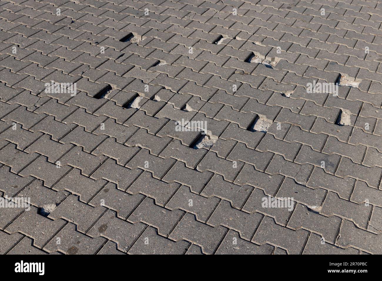 Concrete tile which paved part of the road for traffic, part of the ...