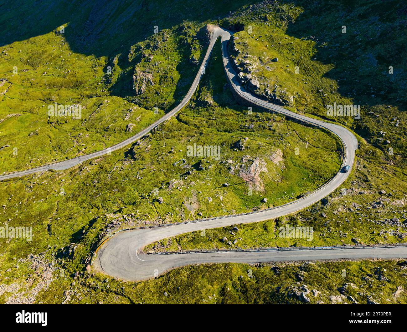 Aerial view of single track road passing through Bealach na Bà pass on ...